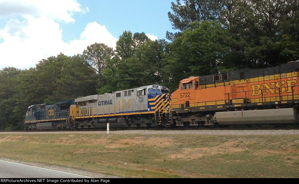CSX Monon Heritage C40-8W 7670 leads CREX ES44AC 1525 and BNSF 5722